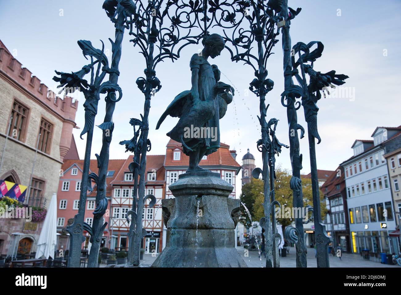 Gänseliesel fountain landmark statue in Göttingen Germany. Profile view ...