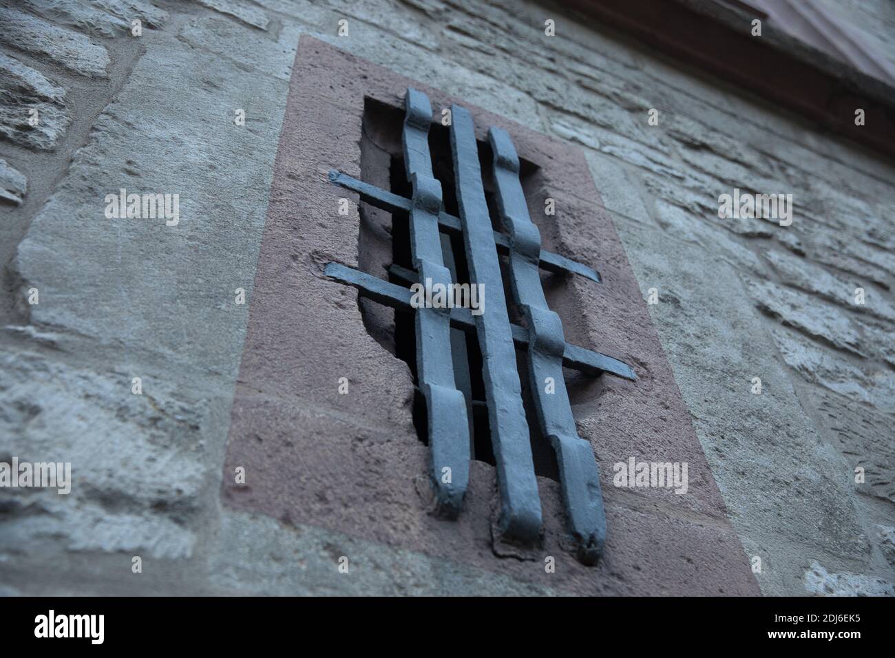 Medieval wall with metal barred window. Gottingen, Germany Stock Photo ...