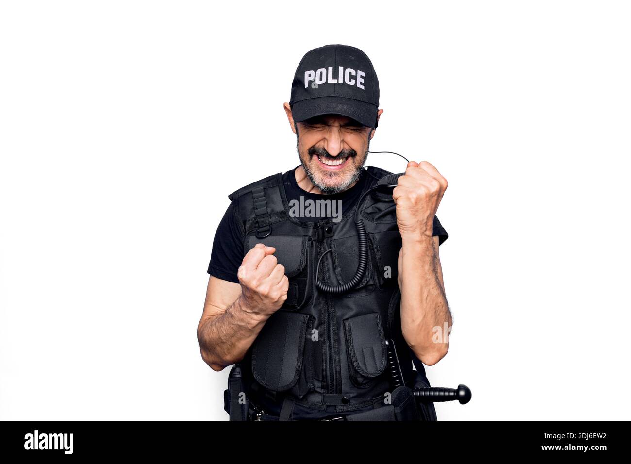 Middle age policeman wearing police uniform and bulletproof vest over ...