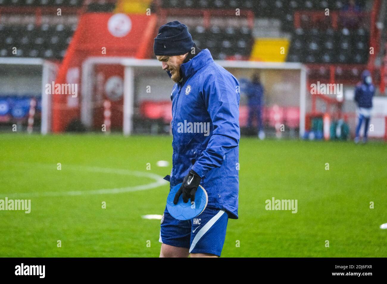 Crawley, UK. 13th Dec, 2020. Chelsea coach setting up warm up drill ...