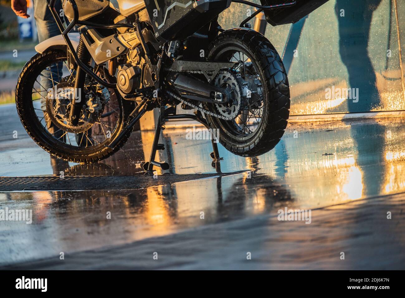 Motorcycle Car Wash. A series of photos a biker washes his motorcycle ...