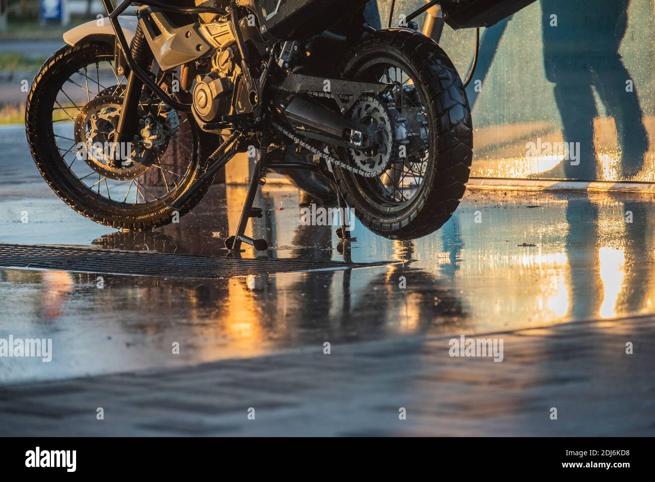 Motorcycle Car Wash. A series of photos a biker washes his motorcycle ...