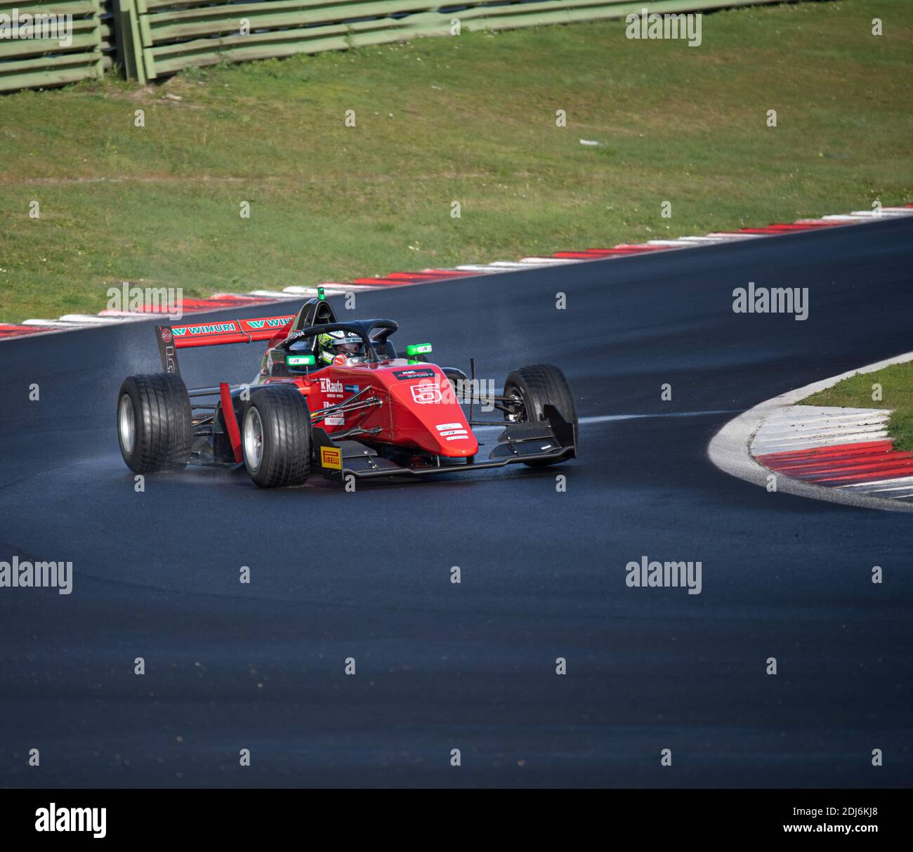 Racing car wet track hi-res stock photography and images - Alamy