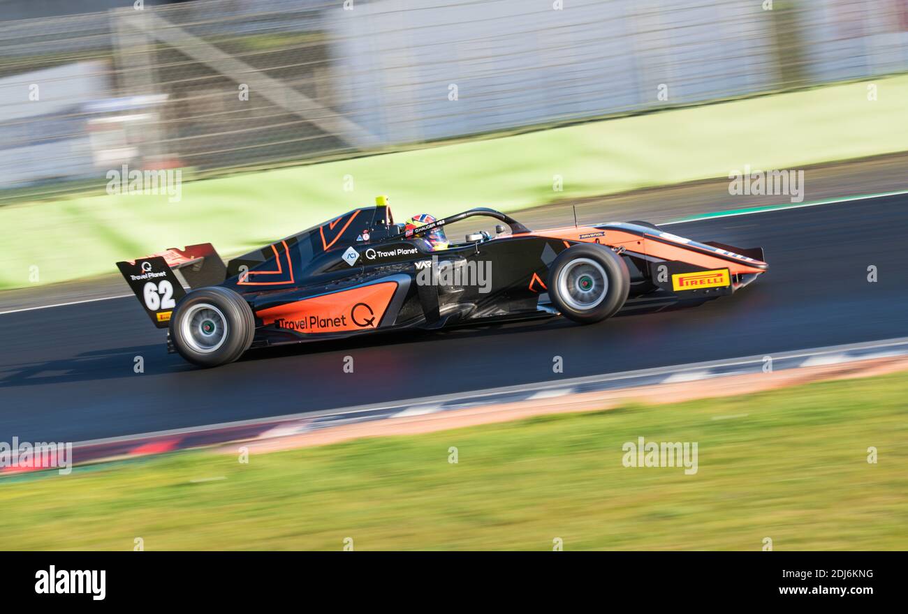 Racing car single seater modern formula in action close up blurred ...