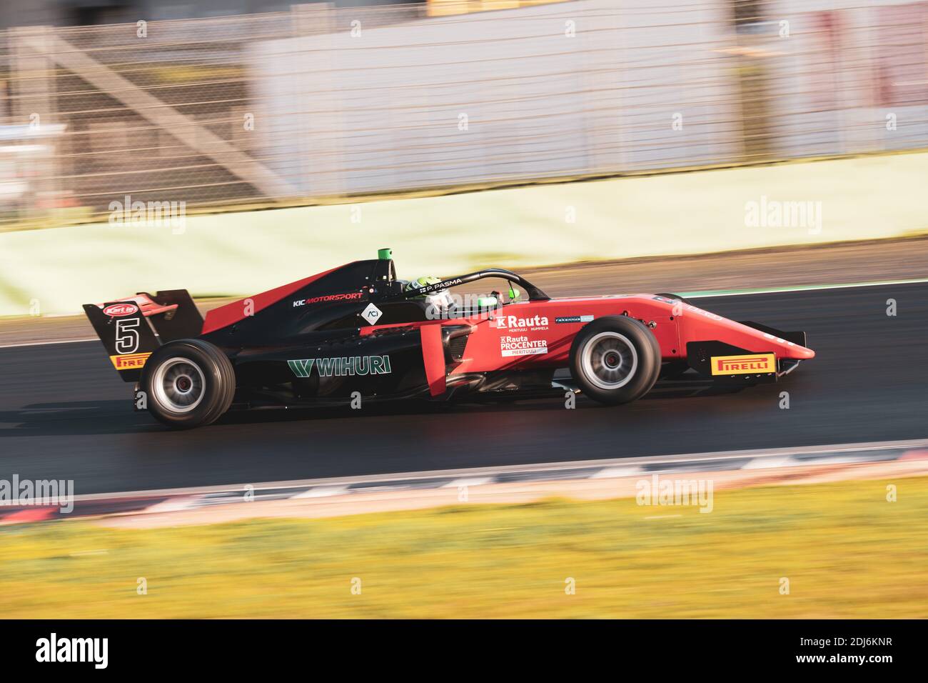Racing car single seater modern formula in action close up blurred ...