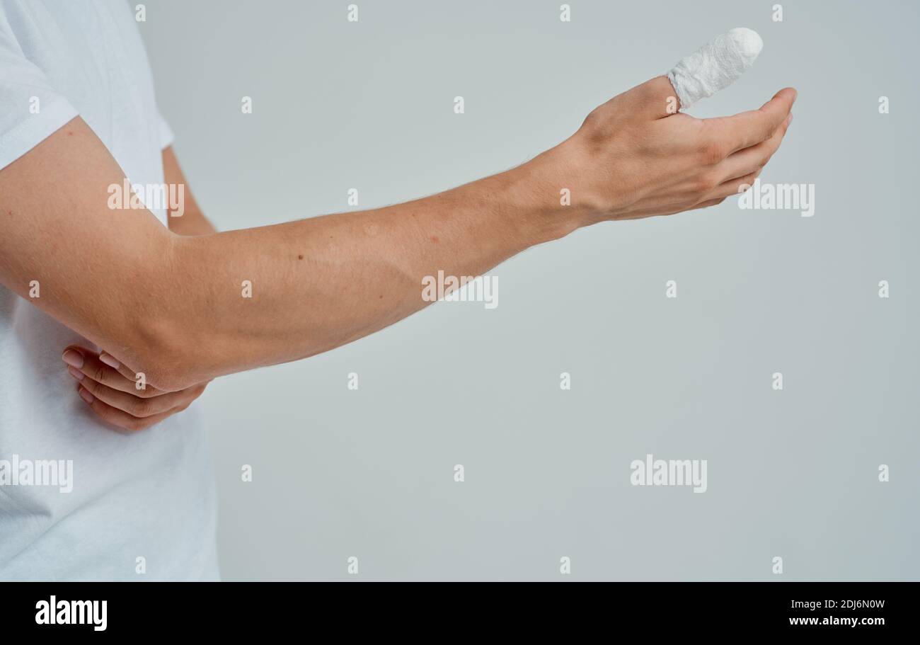 man with broken thumb health problems medicine patient Stock Photo - Alamy
