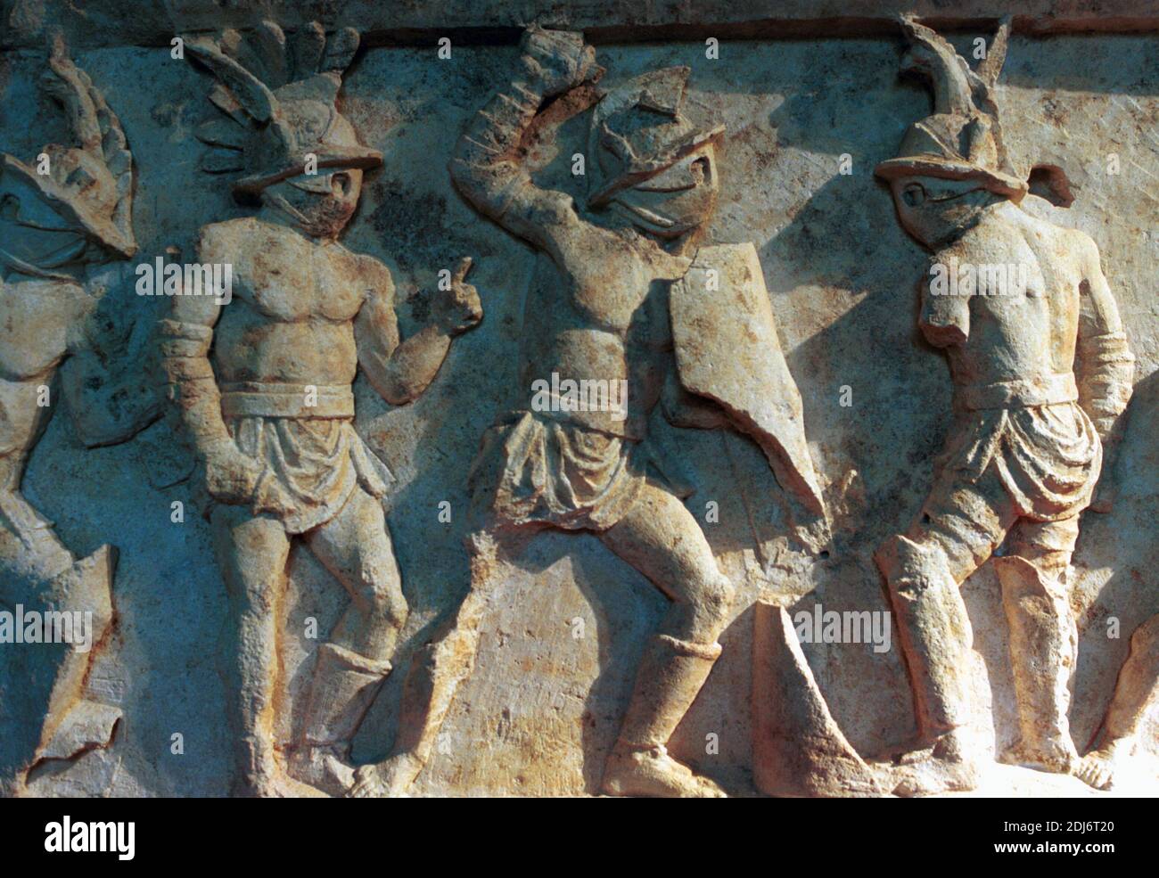 Relief inside the Colosseum representing gladiators fighting, Rome ...