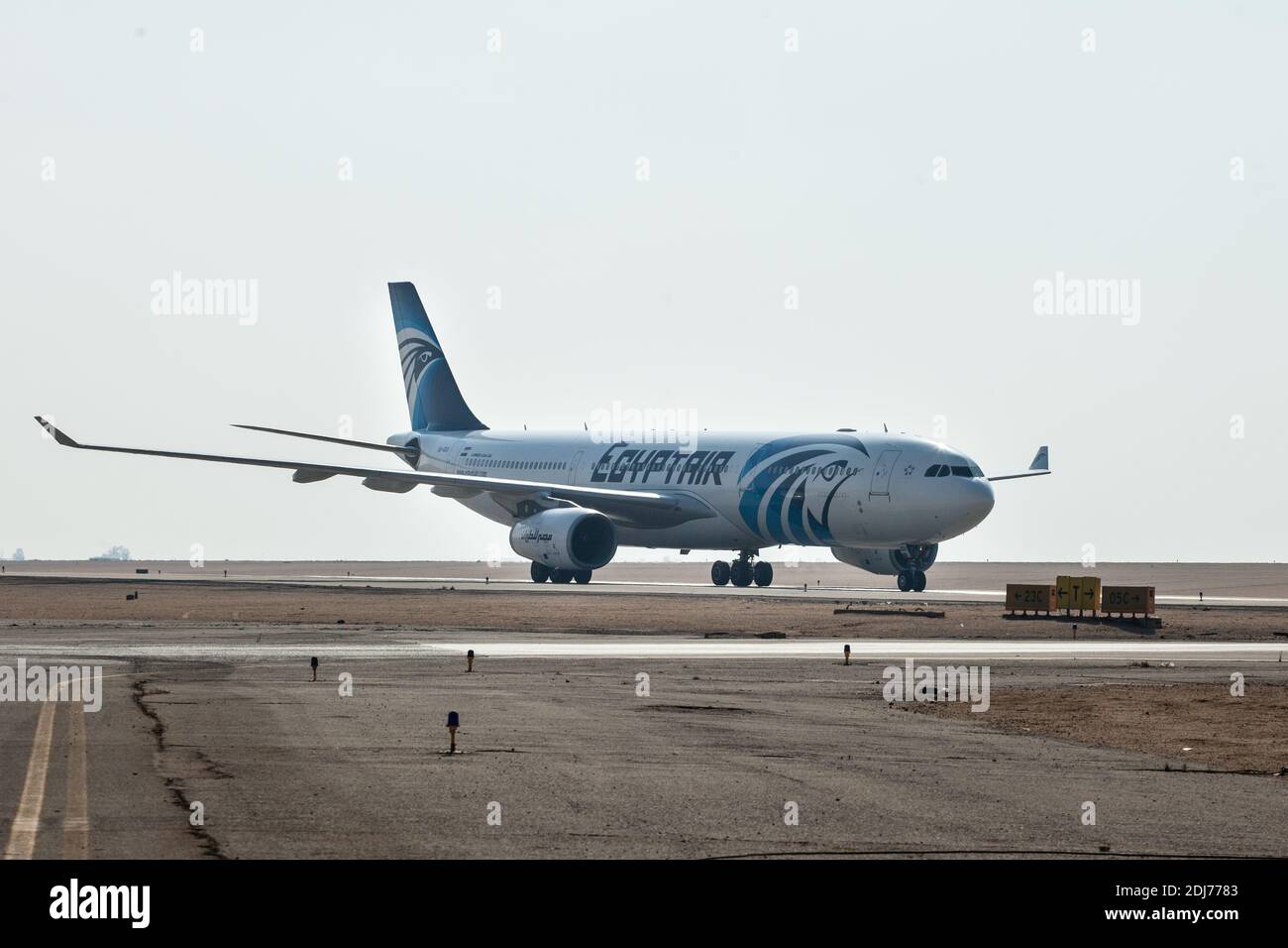 An Egyptair aircraft prepares to take off from the runway of Cairo ...