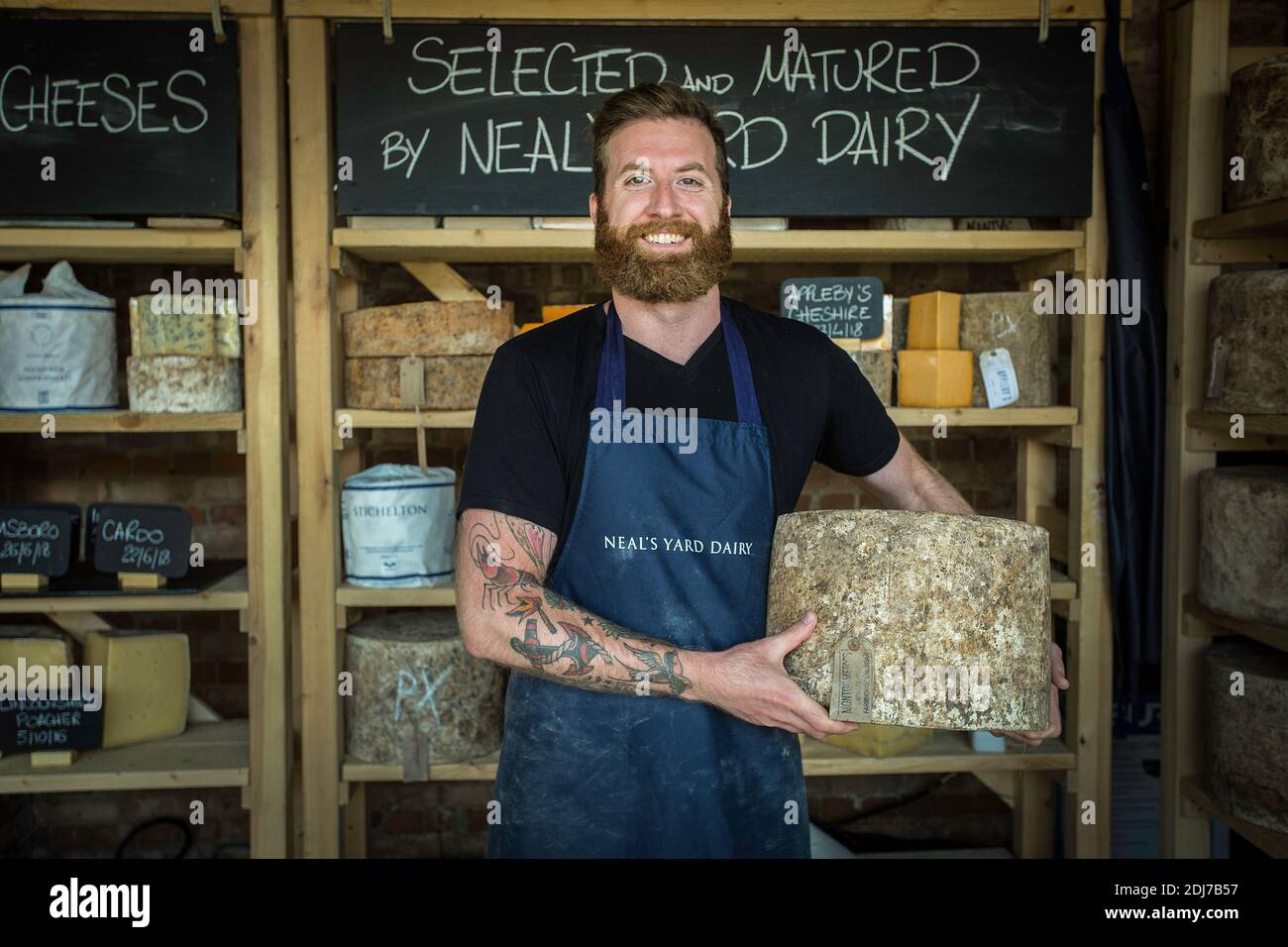 GREAT BRITAIN / England / Man holding cheese Stock Photo - Alamy
