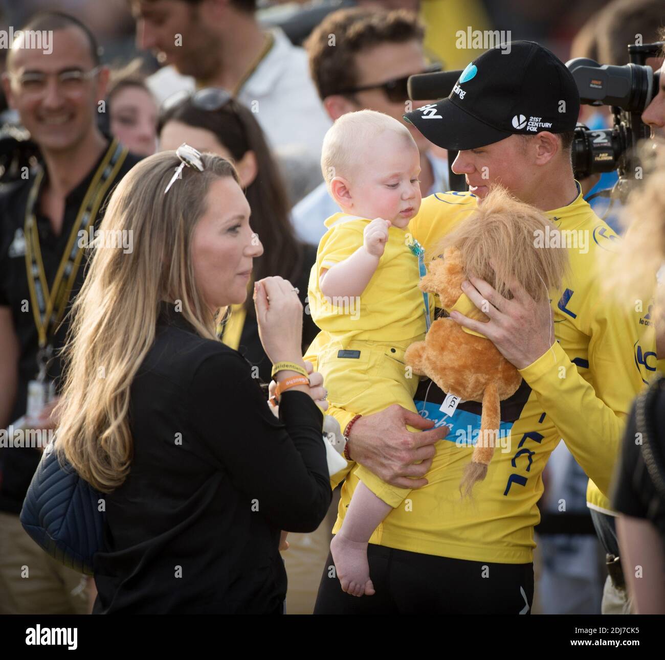 Chris Froome of Great Britain and Team Sky celebrates with his baby and ...