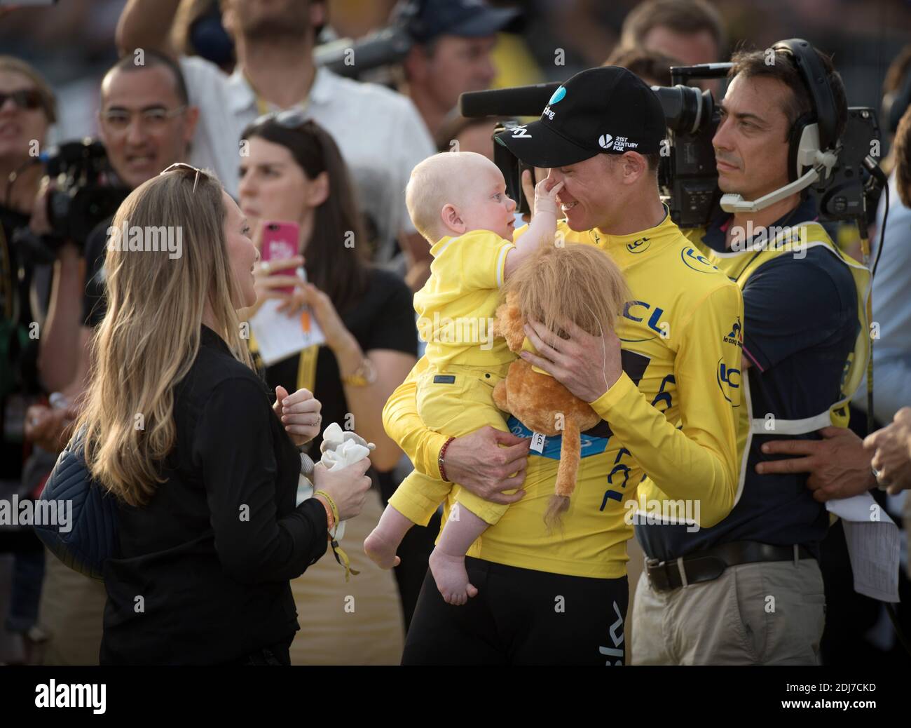 Chris Froome of Great Britain and Team Sky celebrates with his baby and ...