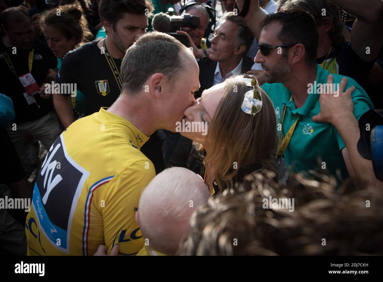 Chris Froome of Great Britain and Team Sky celebrates with his baby and ...