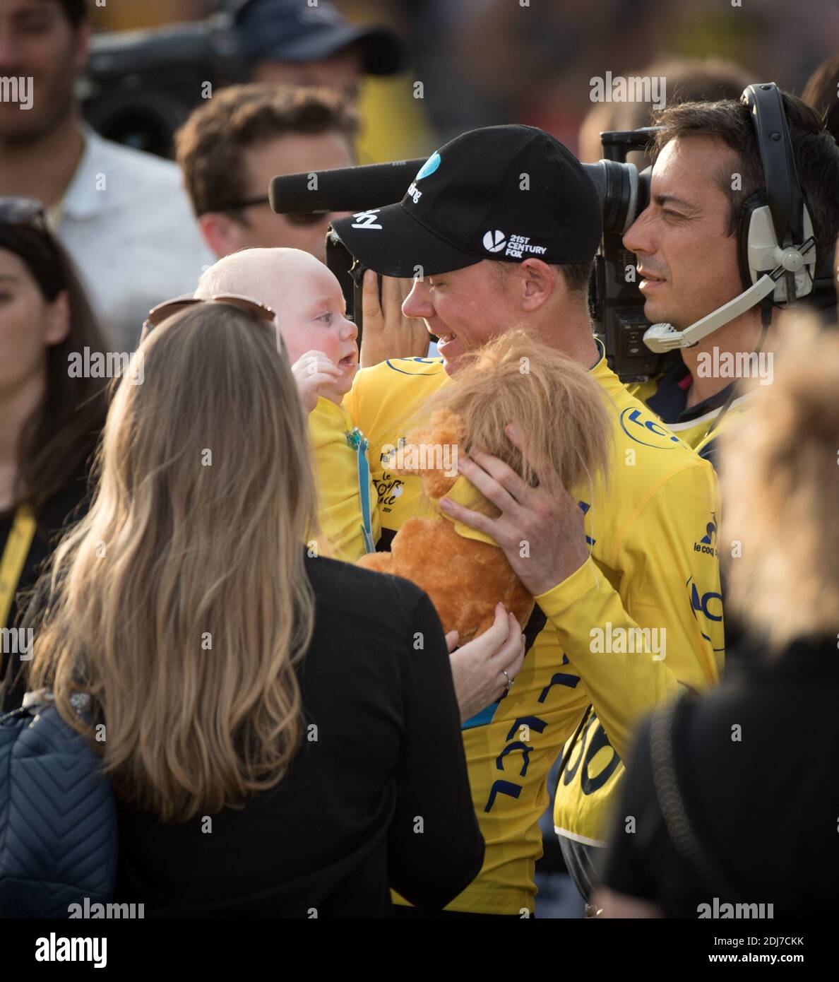 Chris Froome of Great Britain and Team Sky celebrates with his baby and ...