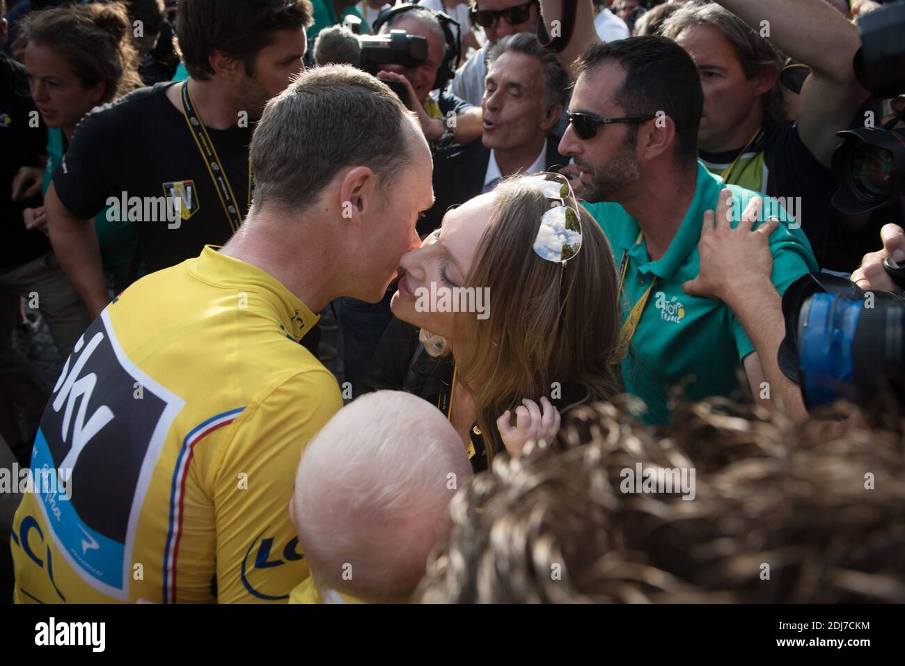 Chris Froome of Great Britain and Team Sky celebrates with his baby and ...