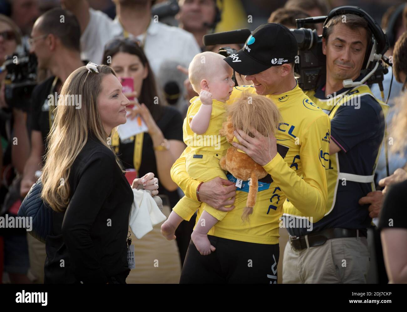 Chris Froome of Great Britain and Team Sky celebrates with his baby and ...