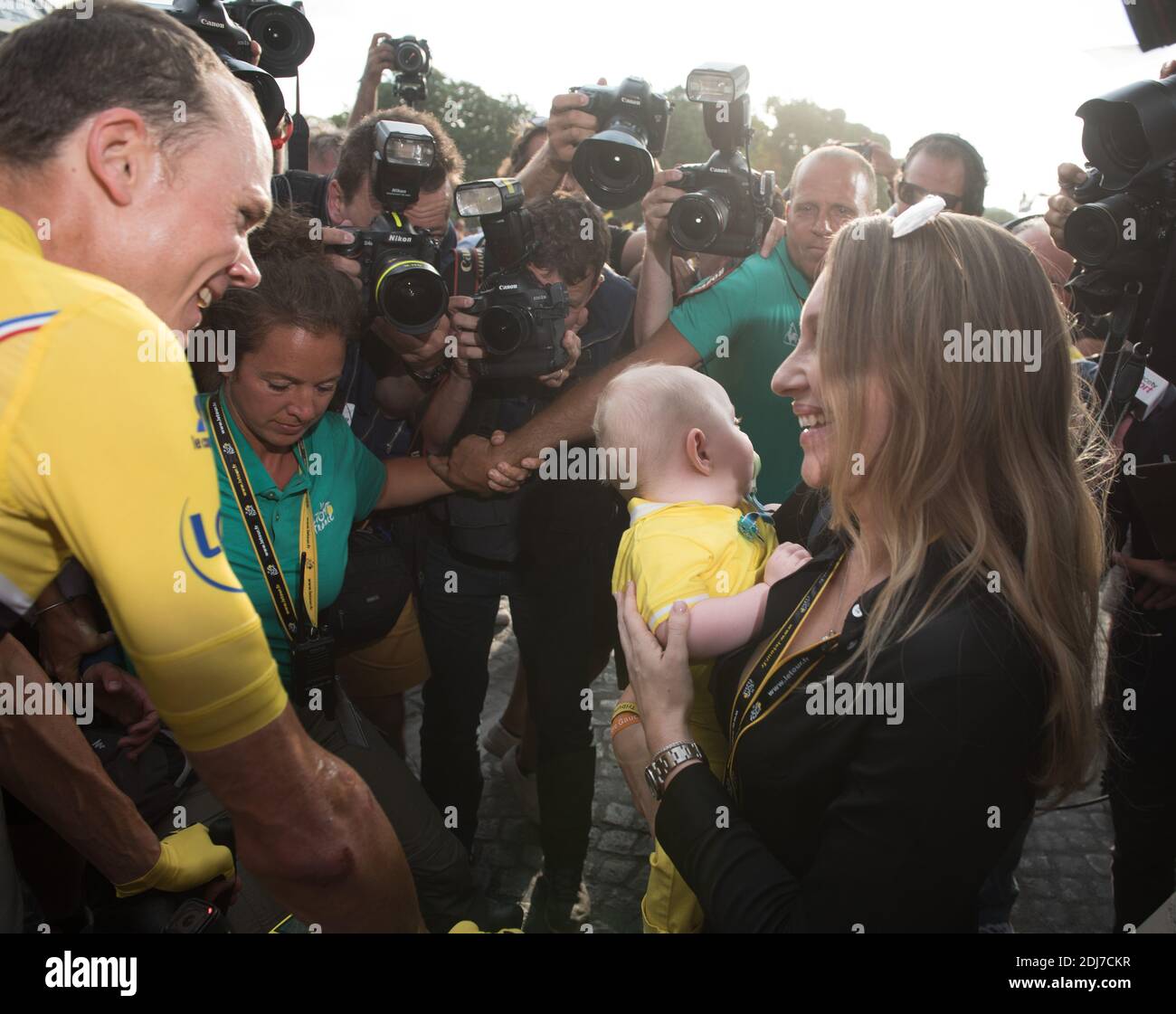 Chris Froome of Great Britain and Team Sky celebrates with his baby and ...