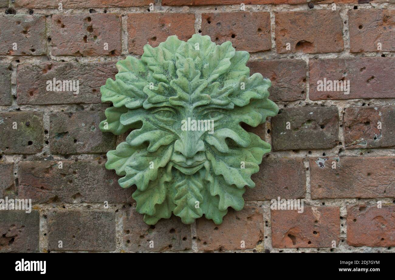 A plaque of the Green Man, a traditional "pagan" fertility figure Stock ...