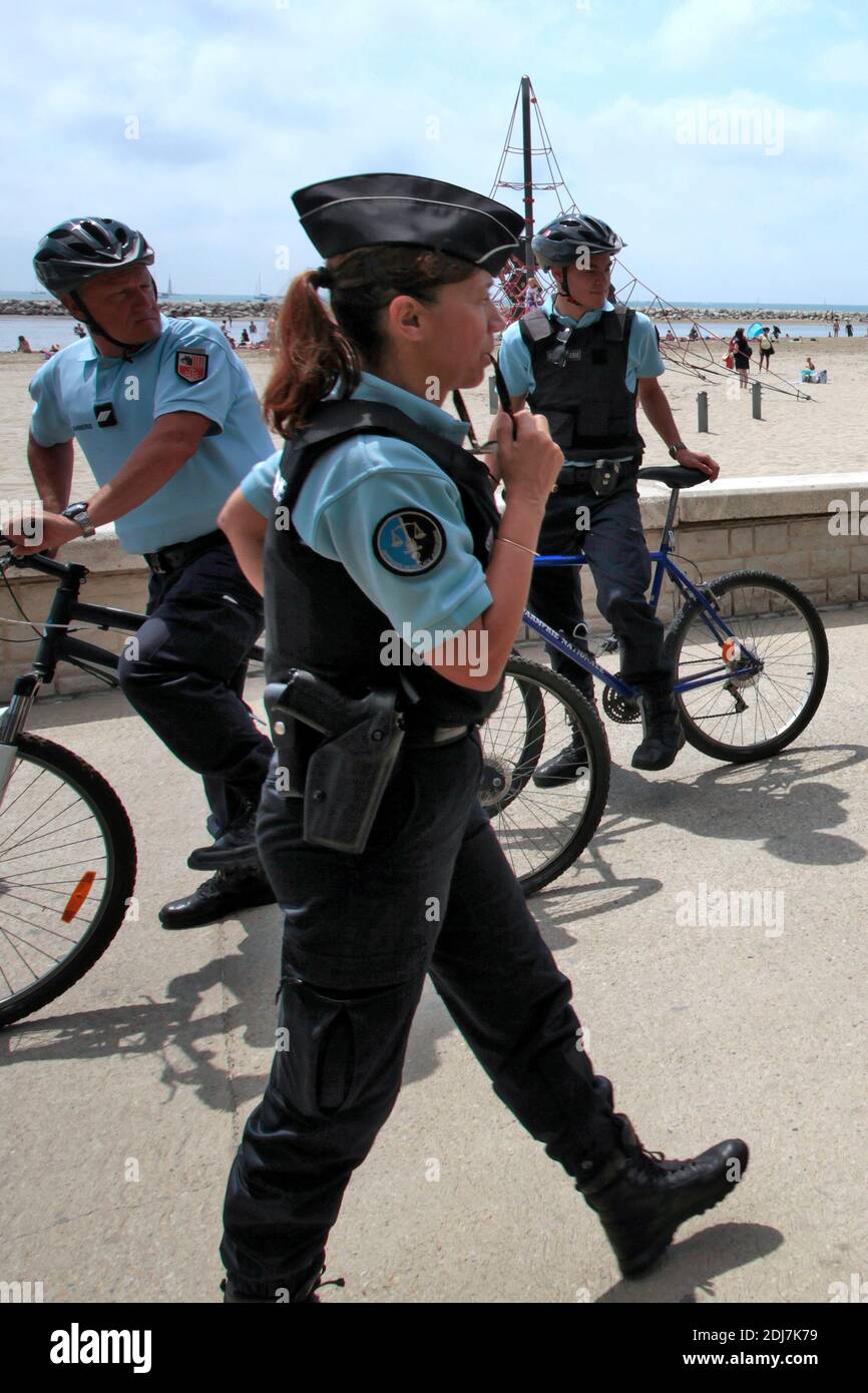 Armed national and municipal police forces as well as military officers ...