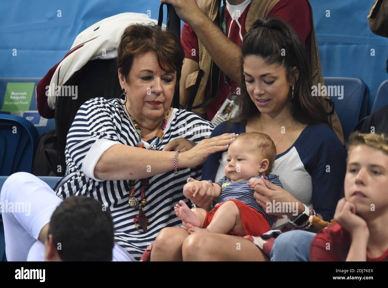 Debbie Phelps, Nicole Johnson and her son Boomer Robert Phelps attend ...
