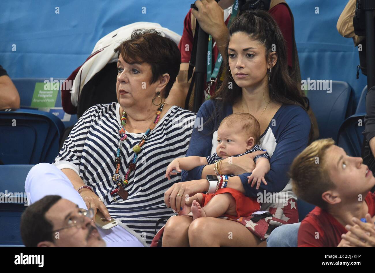 Debbie Phelps, Nicole Johnson and her son Boomer Robert Phelps attend ...