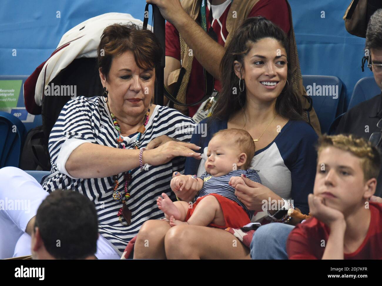 Debbie Phelps, Nicole Johnson and her son Boomer Robert Phelps attend ...