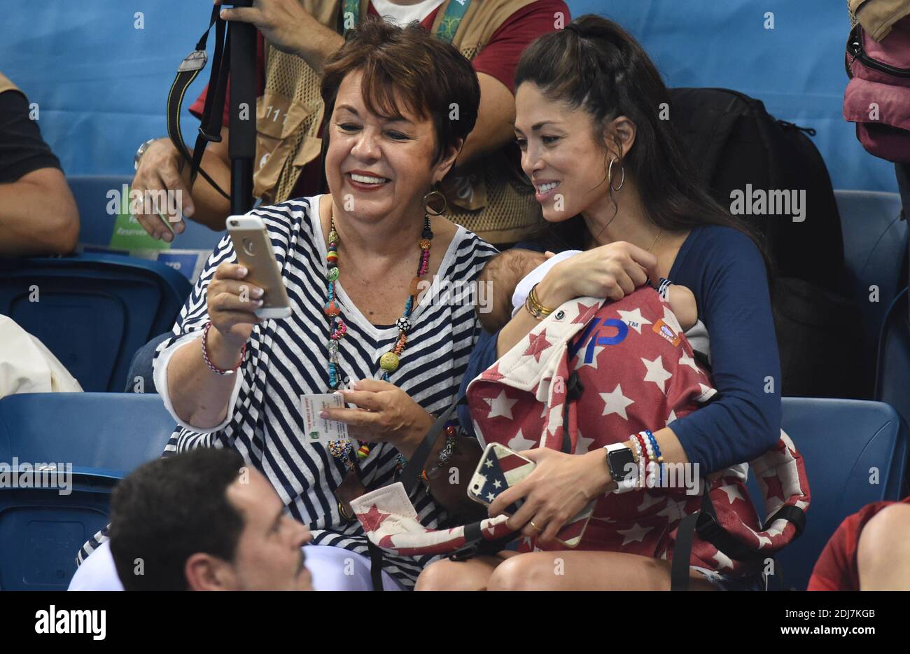Debbie Phelps, Nicole Johnson and her son Boomer Robert Phelps attend ...