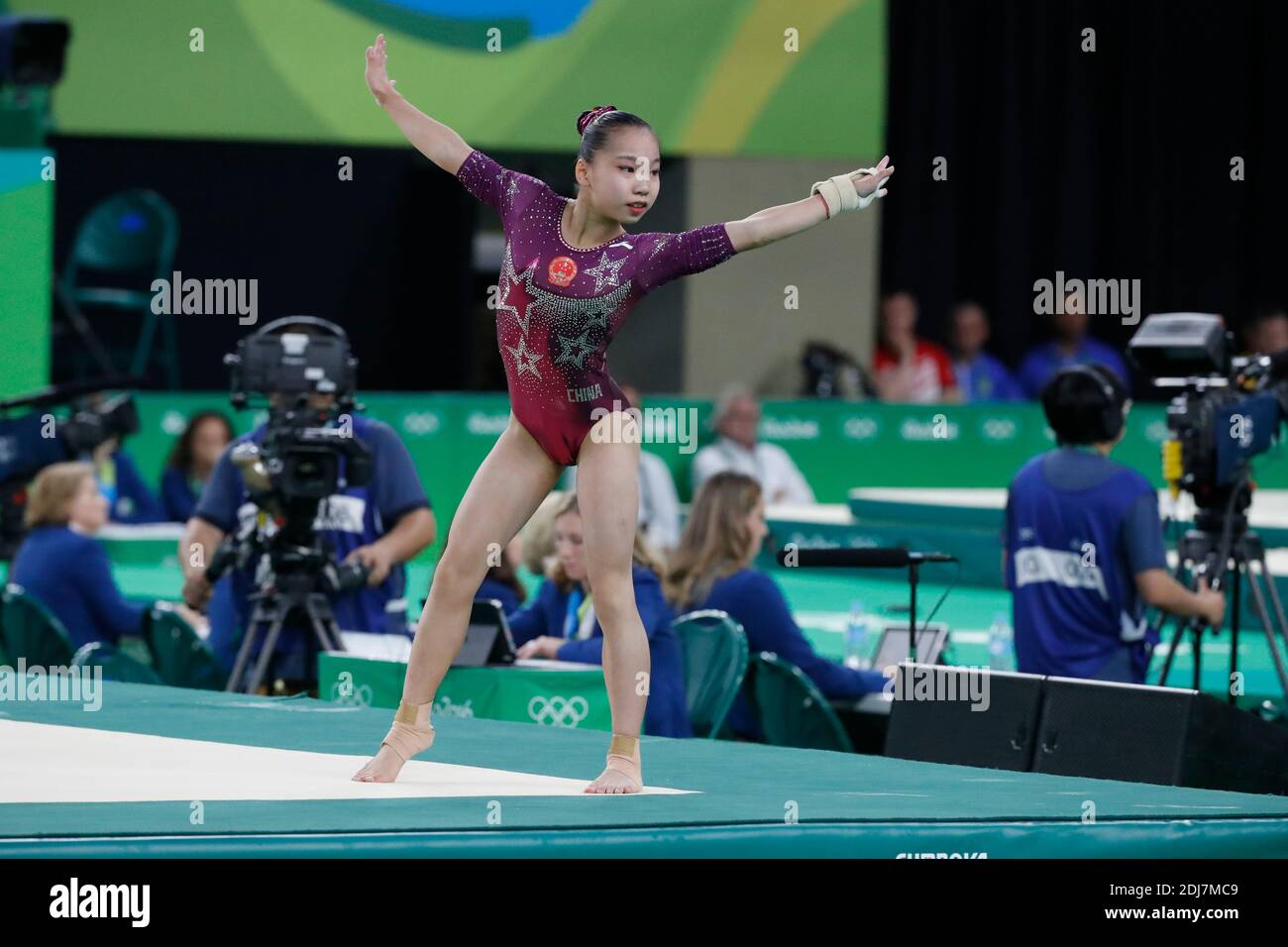 China's Yan Wang competing in the Artistic Gymnastics Women's team ...
