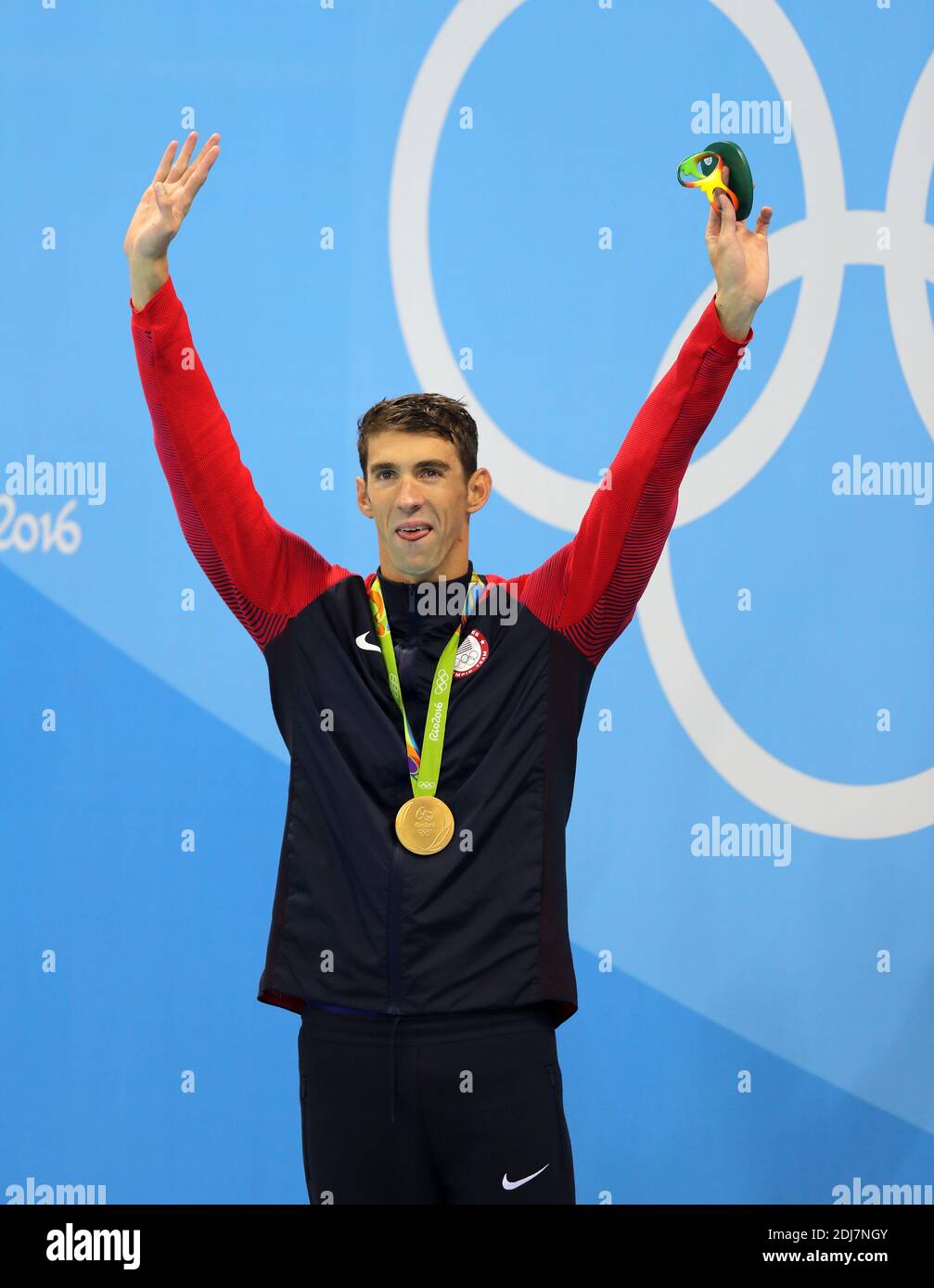 USA's Michael Phelps celebrates with his gold medal during the podium ...