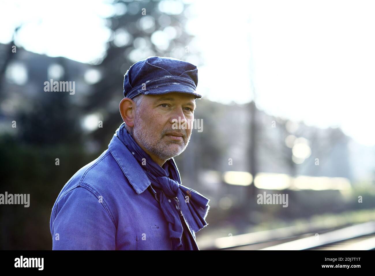 Portrait of train maintenance worker in blue working overall Stock ...
