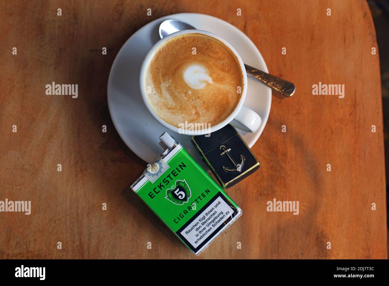 Cup of coffee, lighter and cigarettes.Coffee and smoking cigarettes ...
