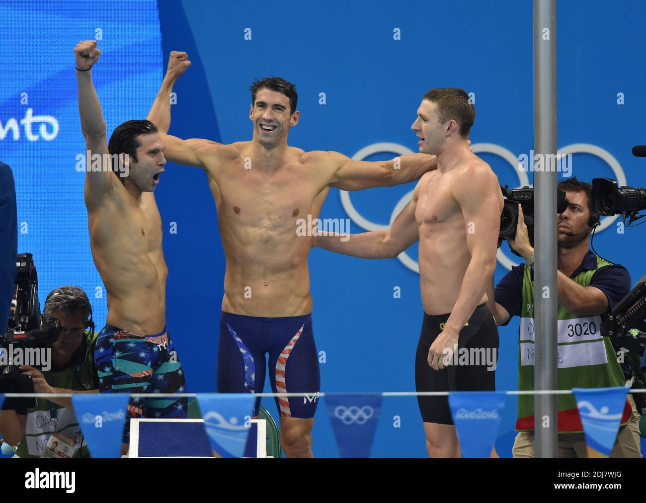 USA's Ryan Murphy, Michael Phelps, Cody Miller celebrate after the Men ...