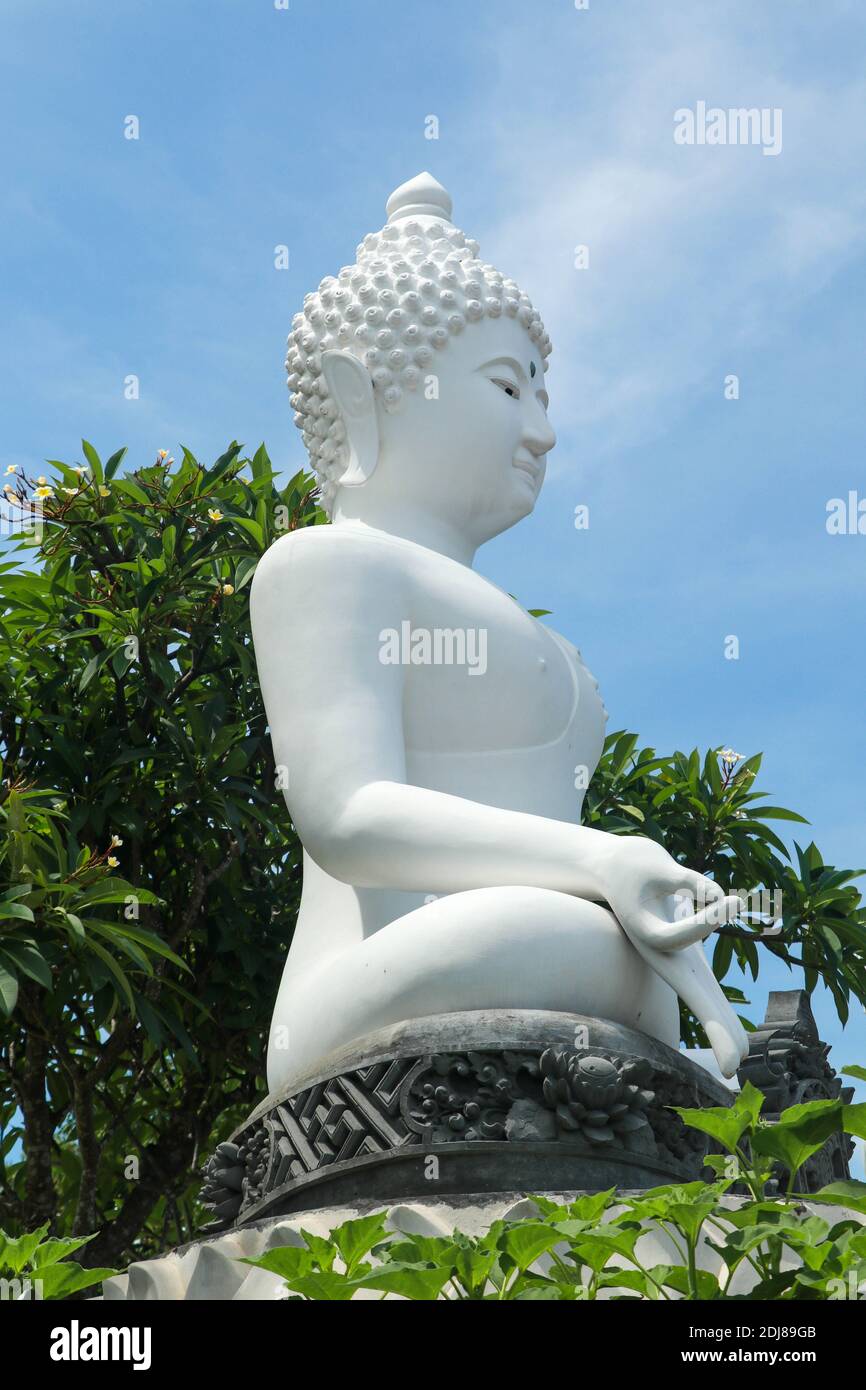Side View Of White Buddha Statue At Brahmavihara Arama, North Bali ...