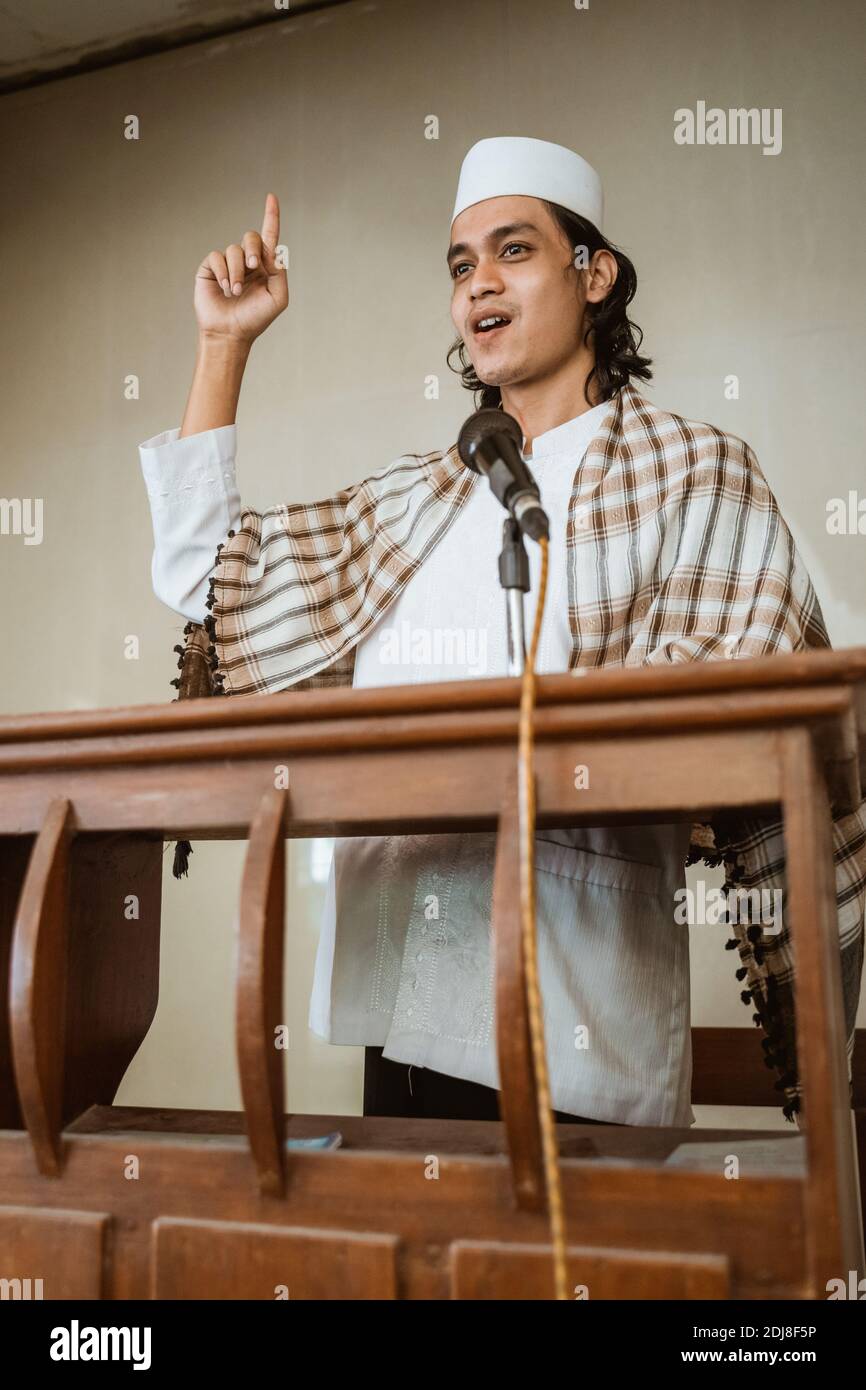Portrait of muslim male preacher speech sharing about islam during ...