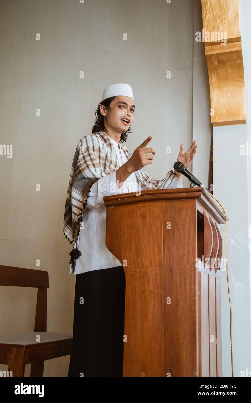 Portrait of muslim male preacher speech sharing about islam during ...