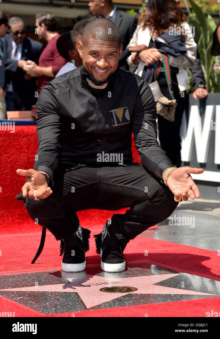 Singer Usher is honored with a star on the Hollywood Walk of Fame in ...