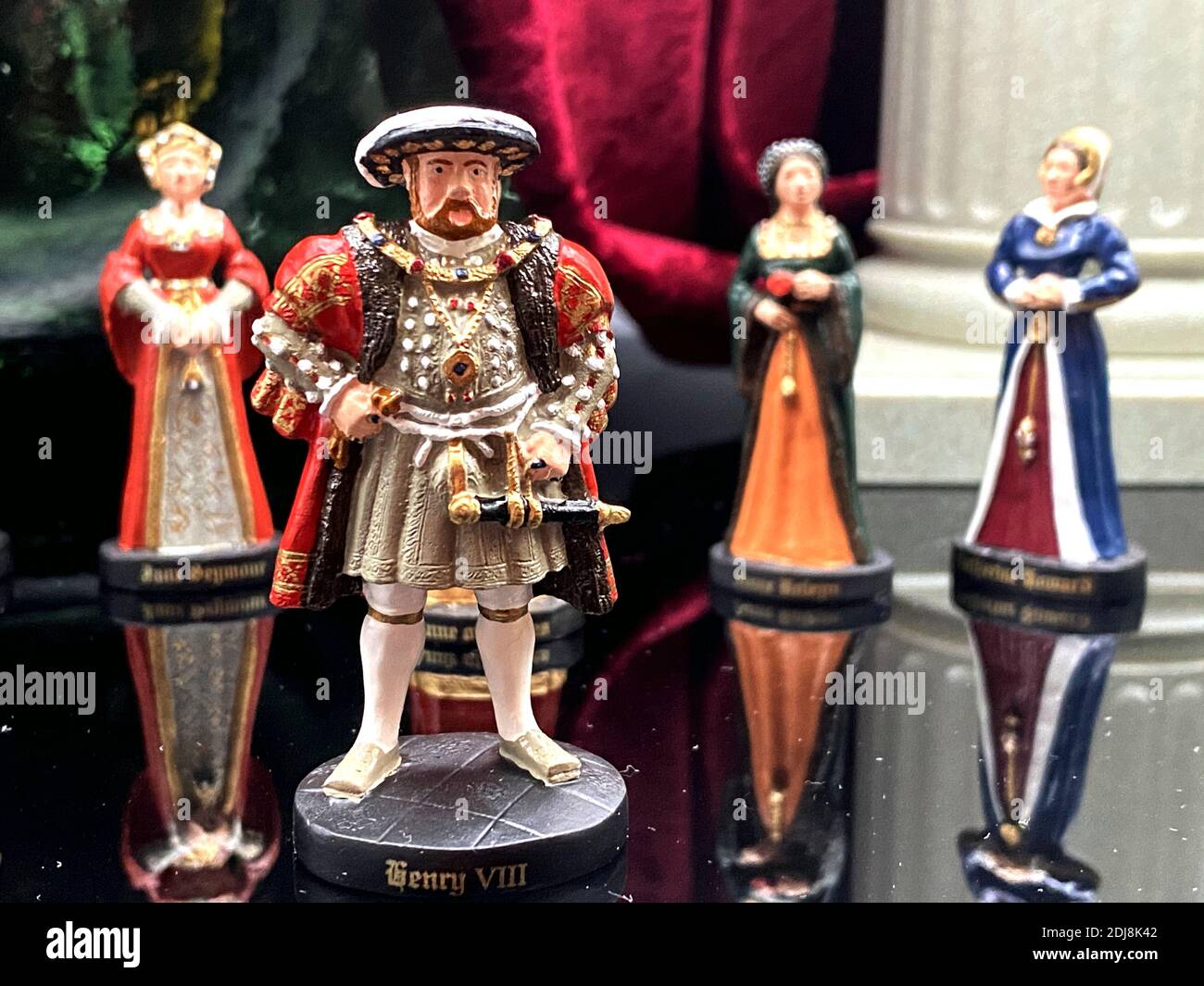 Vintage figurine of king Henry viii on other figurines backgroun Stock ...