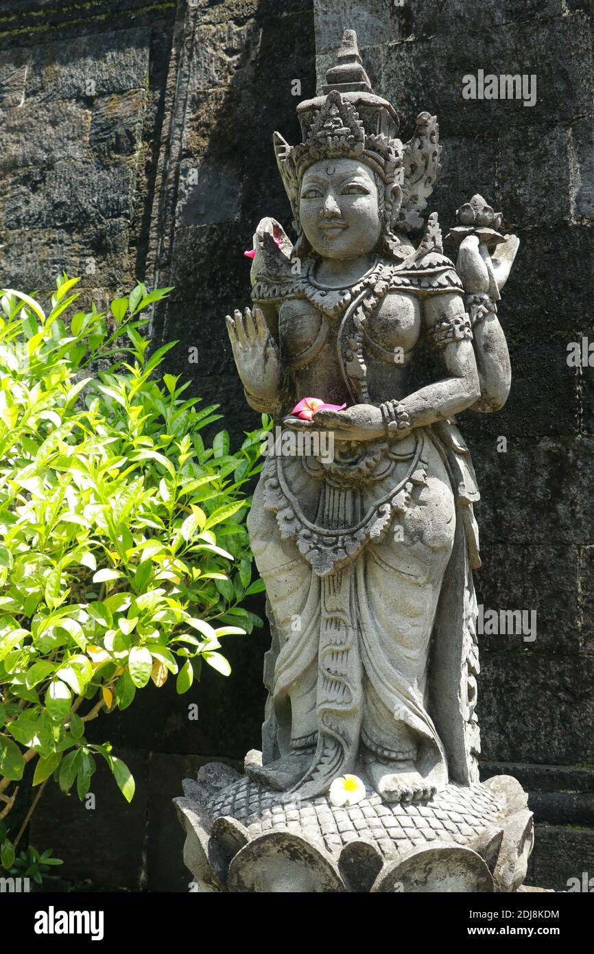 Statues of guardian gods temple in Bali. Brahma Vihara Arama with ...