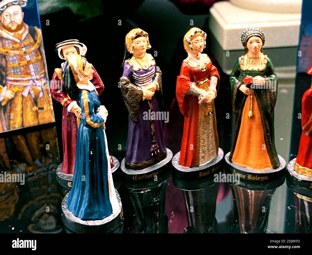 Vintage medieval figurines on a reflective surface Stock Photo - Alamy