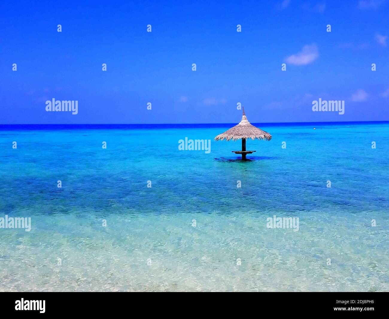 Relaxation spot by the crystal clear beautiful blue water of Maldives ...