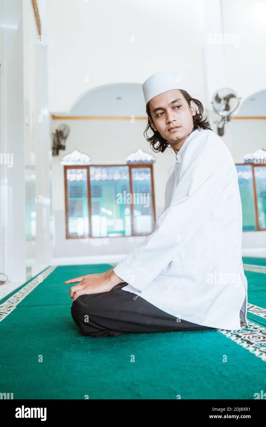 Man muslim doing prayer in the mosque Stock Photo - Alamy