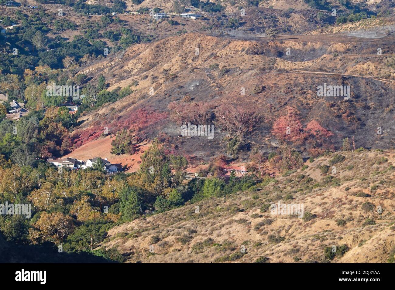 Red phos chek lines along the hillside above Modjeska canyon dropped by ...