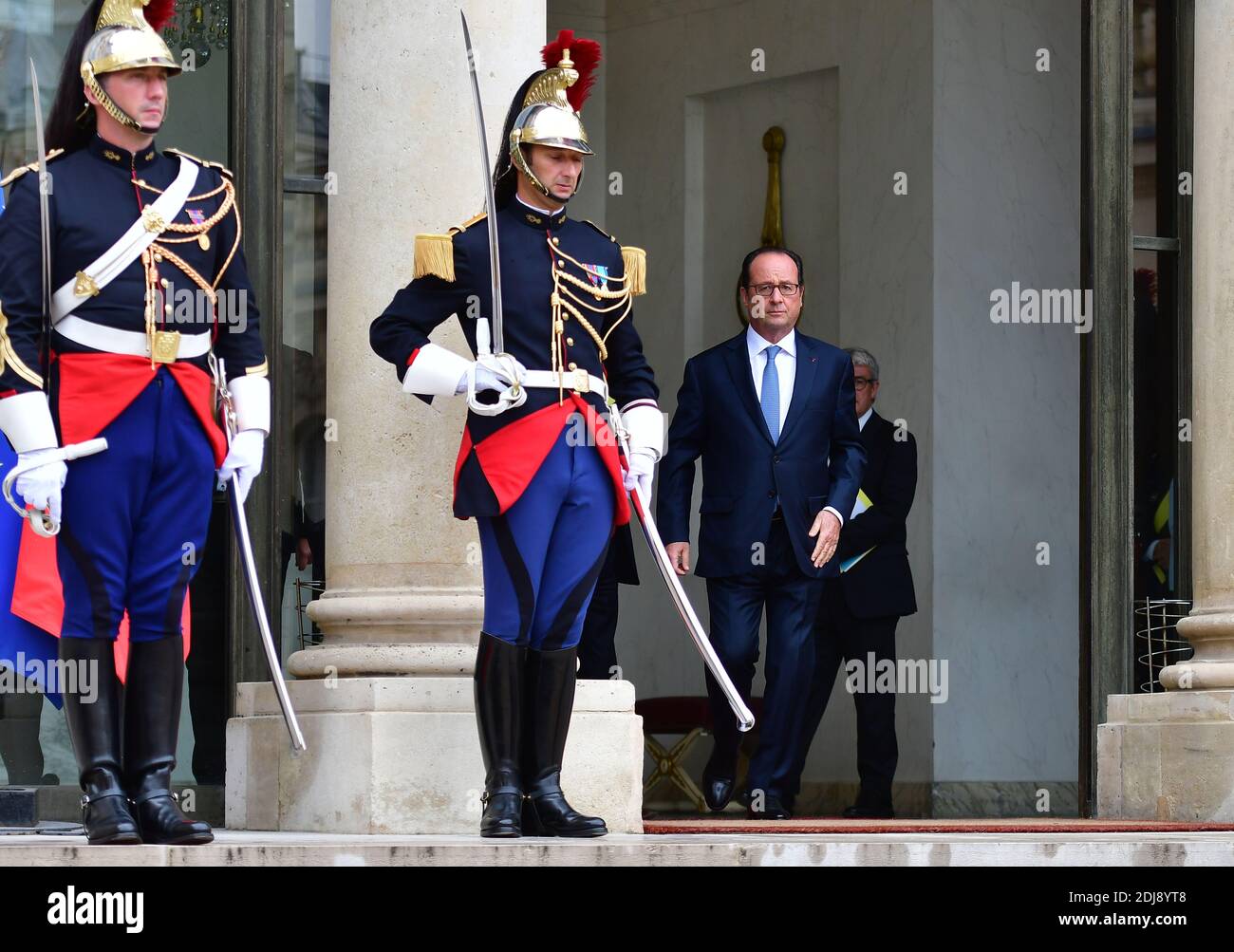 French President Francois Hollande arrives to welcome German Chancellor ...