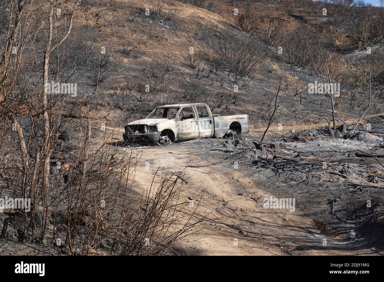 Burnt out pickup truck on Modjeska canyon road after the recent Bond ...