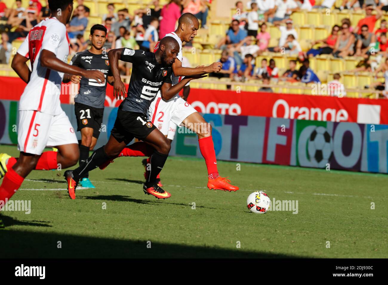 Monaco's Fabinho battling Rennes's Giovanni Sio during the French First ...