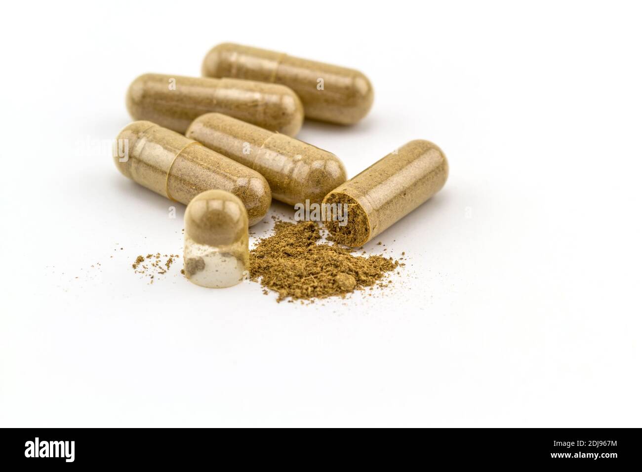 Green capsule medicine pouring hi-res stock photography and images - Alamy