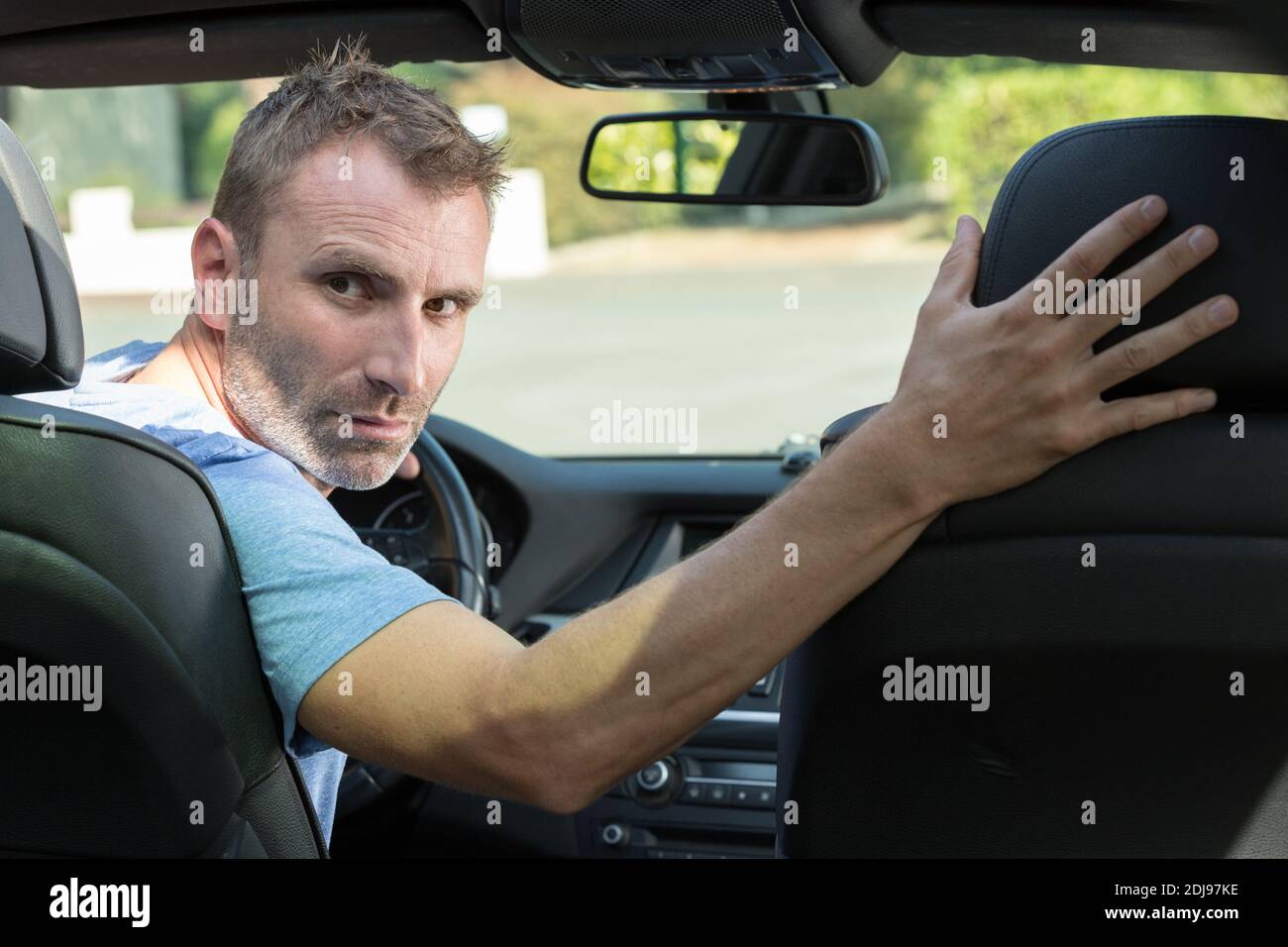 Reverse parking man hi-res stock photography and images - Alamy