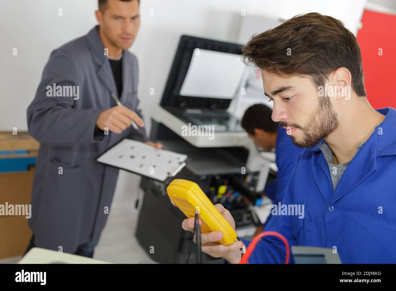 electrician testing industrial machine Stock Photo - Alamy