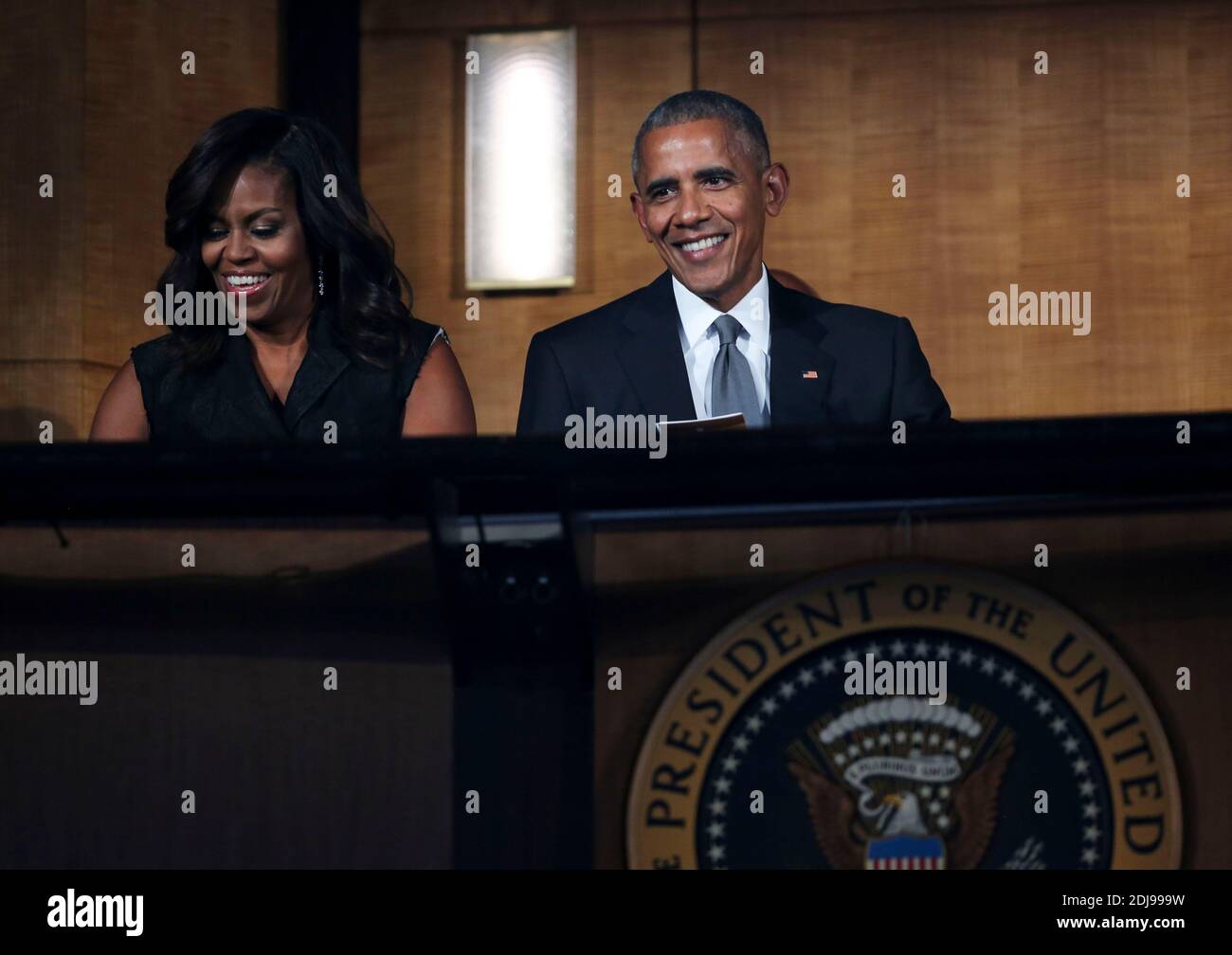 US President Barack Obama and First Lady Michelle Obama attend a ...