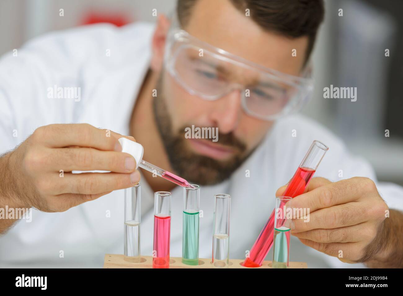 Analyzing data scientists in laboratory hi-res stock photography and ...