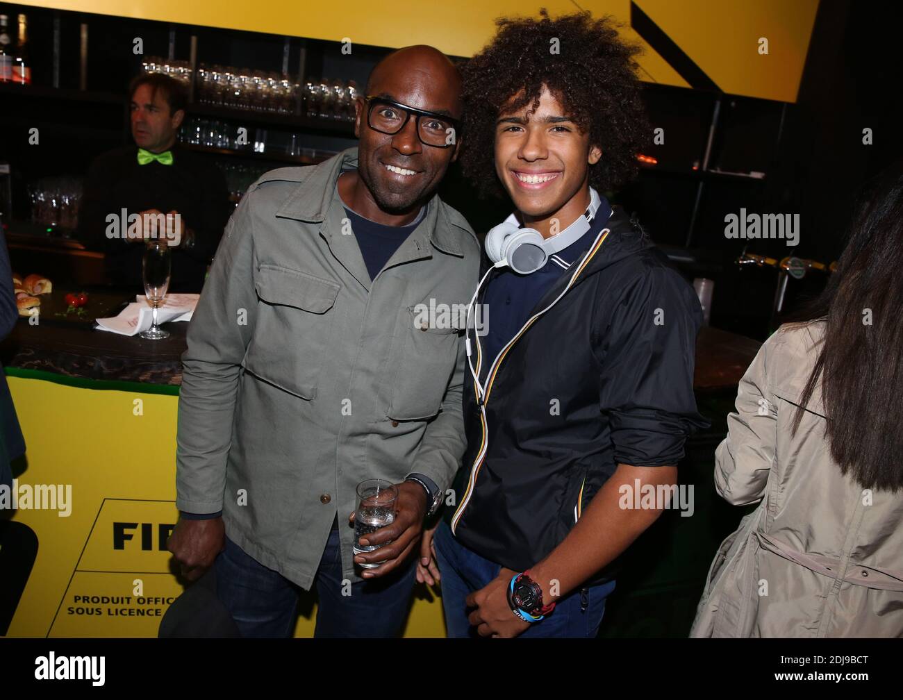 Lucien Jean-Baptiste and his son attending the launch of the new game ...